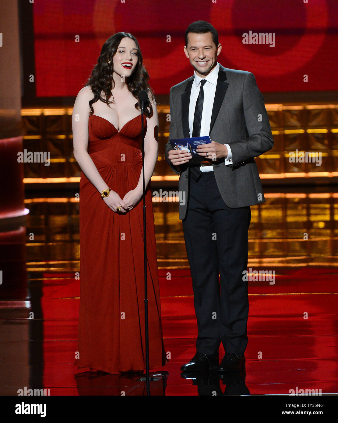 Actress Kat Dennings (L) and actor Jon Cryer appear onstage at the 64th ...