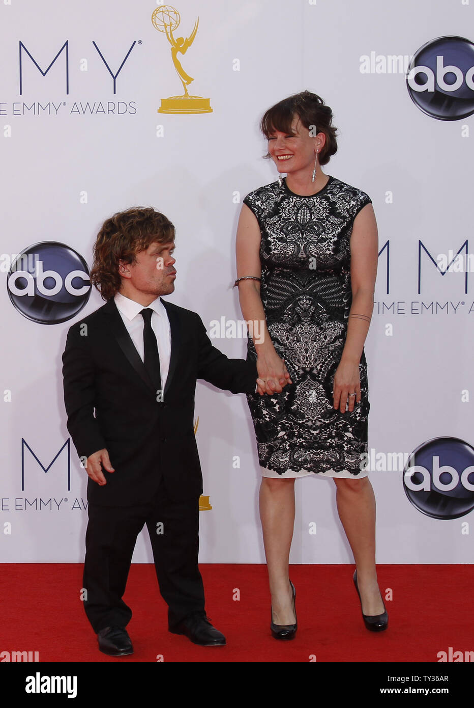 Actor Peter Dinklage and wife Erica Schmidt arrive at the 64th ...