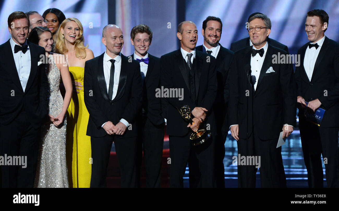 Show creator Gideon Raff, writers Howard Gordon and Alex Gansa with ...