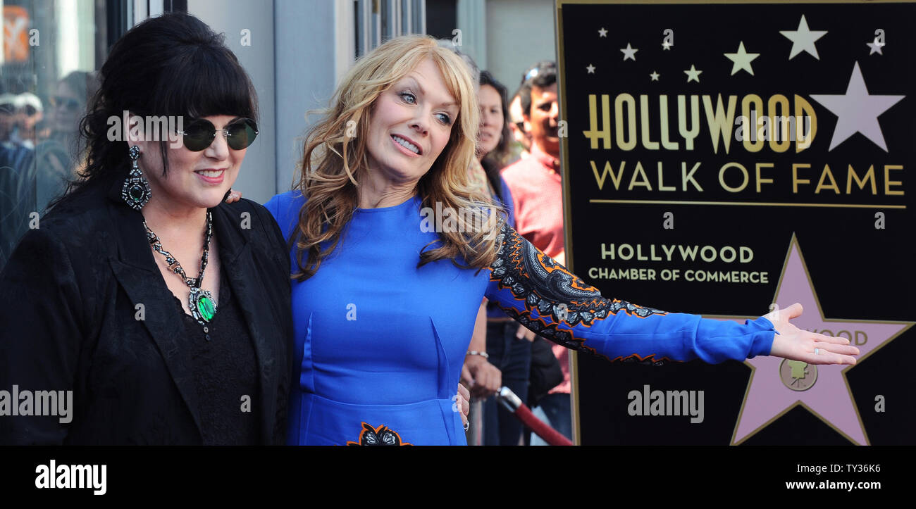 Heart band members Ann Wilson (L) and Nancy Wilson, the singing sisters ...