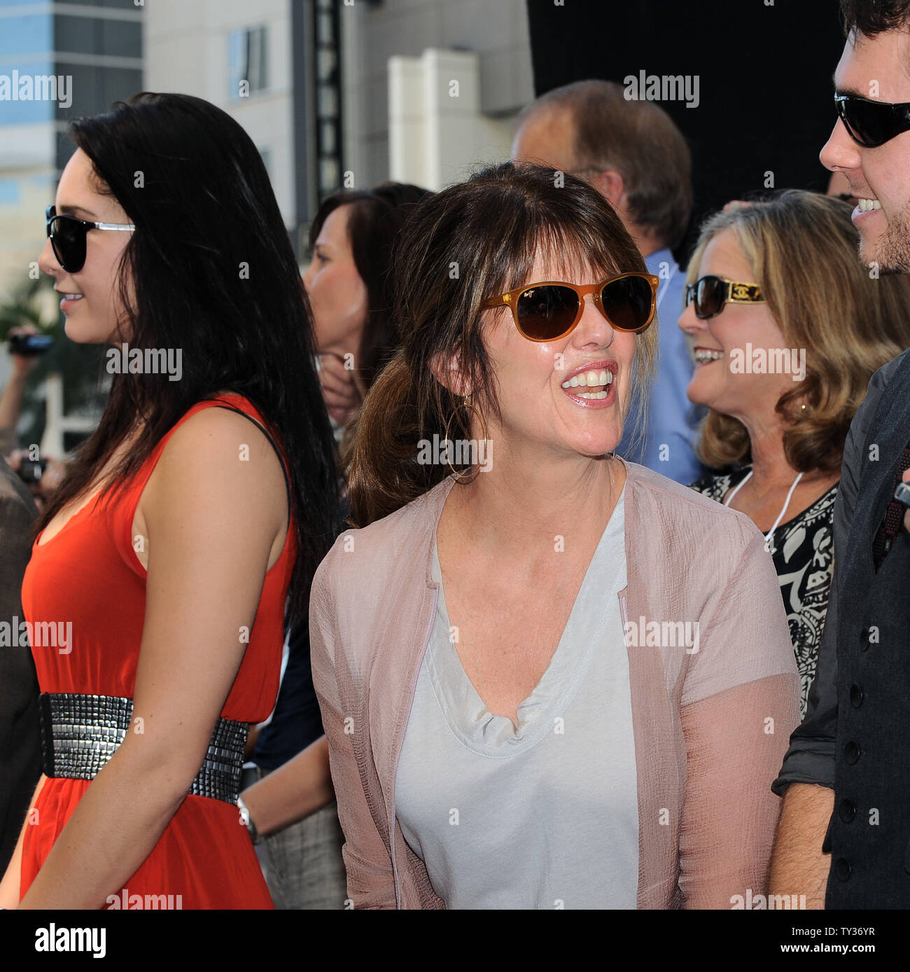 Actress Pam Dawber (C) attends an unveiling ceremony honoring her ...