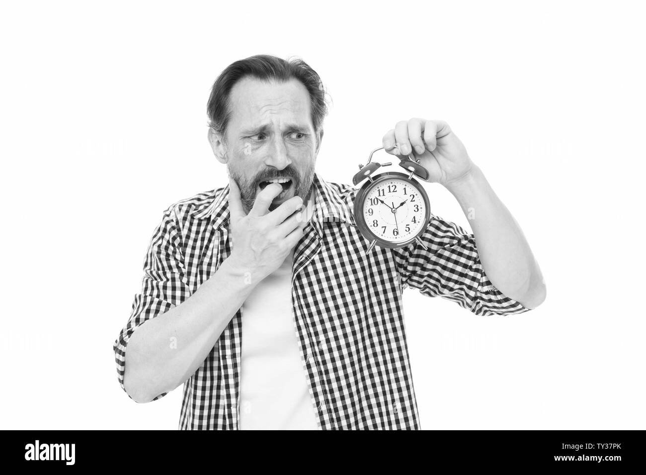Figure out why you are always late. Man bearded mature guy hold alarm ... Figure out why you are always late. Man bearded mature guy hold alarm ...
