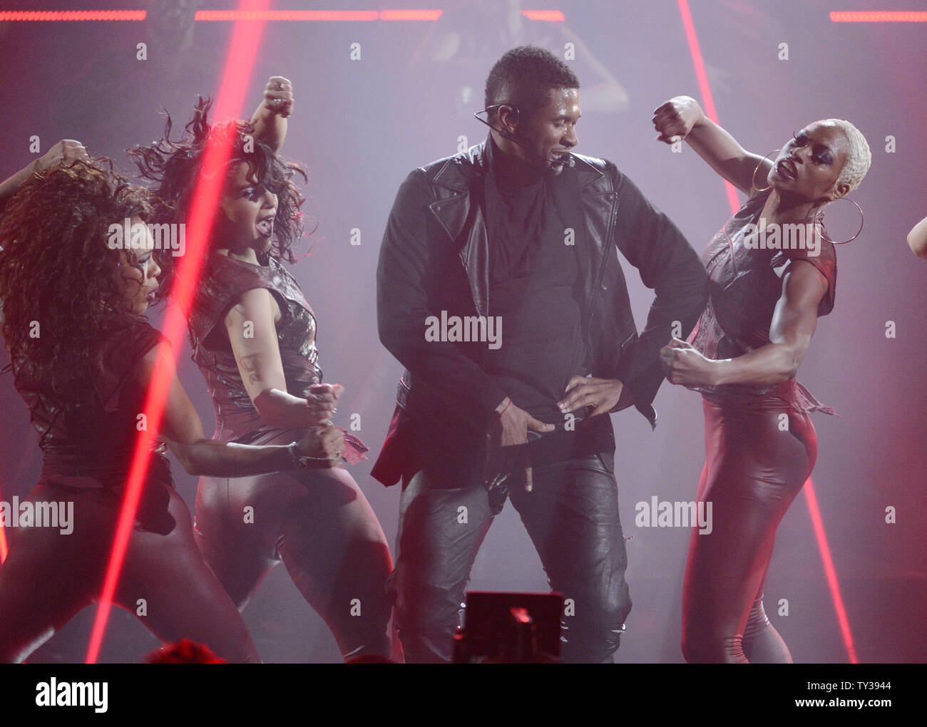 Usher performs onstage at the 40th Annual American Music Awards held at ...