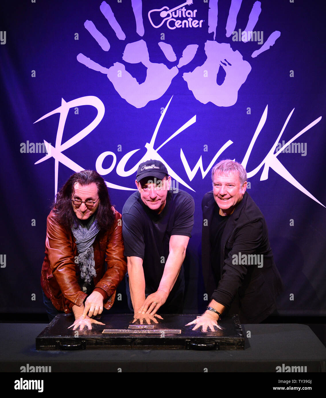 Members of the rock group Rush Geddy Lee, Neil Peart, Alex Lifeson (L-R ...