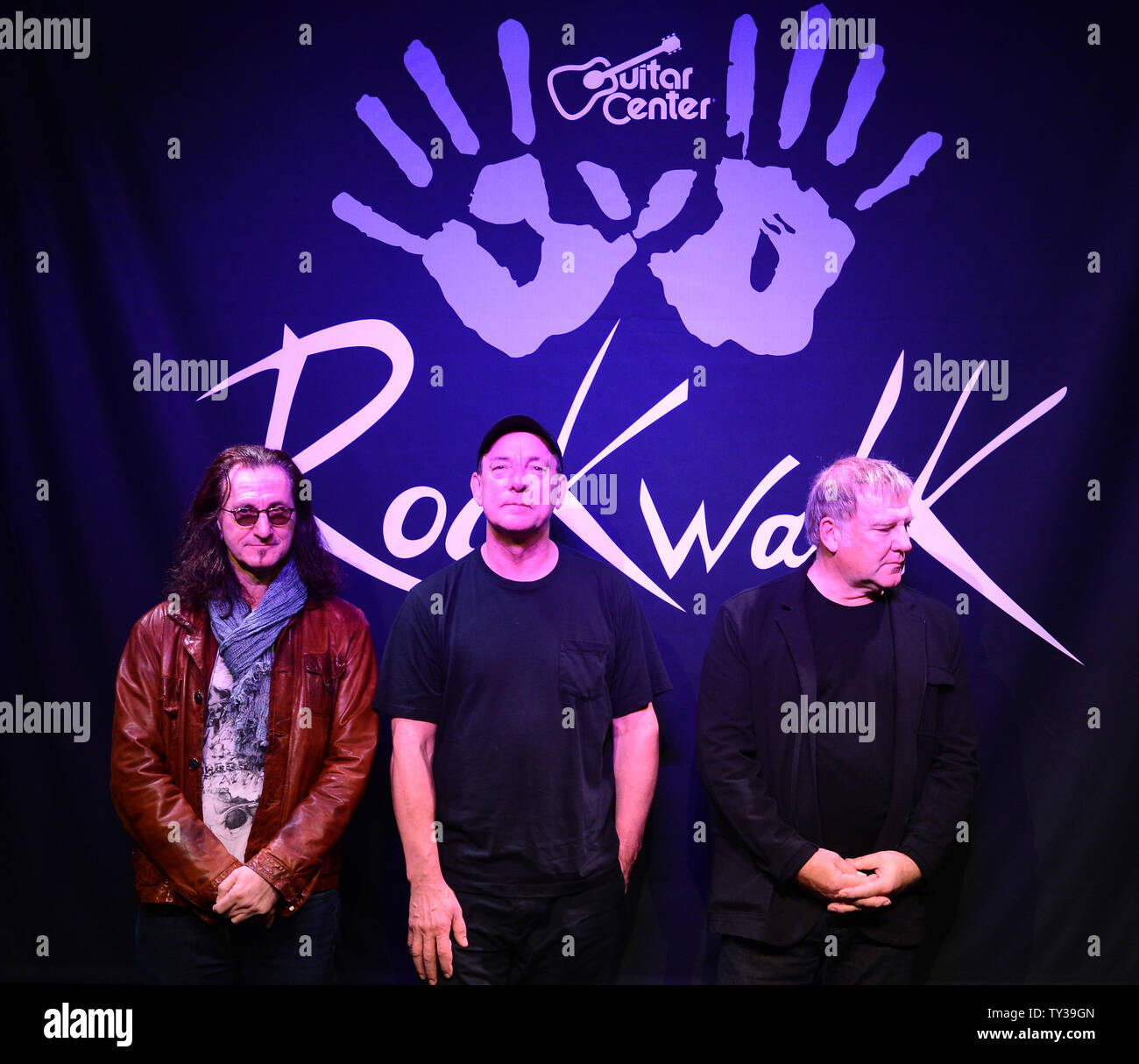 Geddy lee alex lifeson neil peart hi-res stock photography and images ...