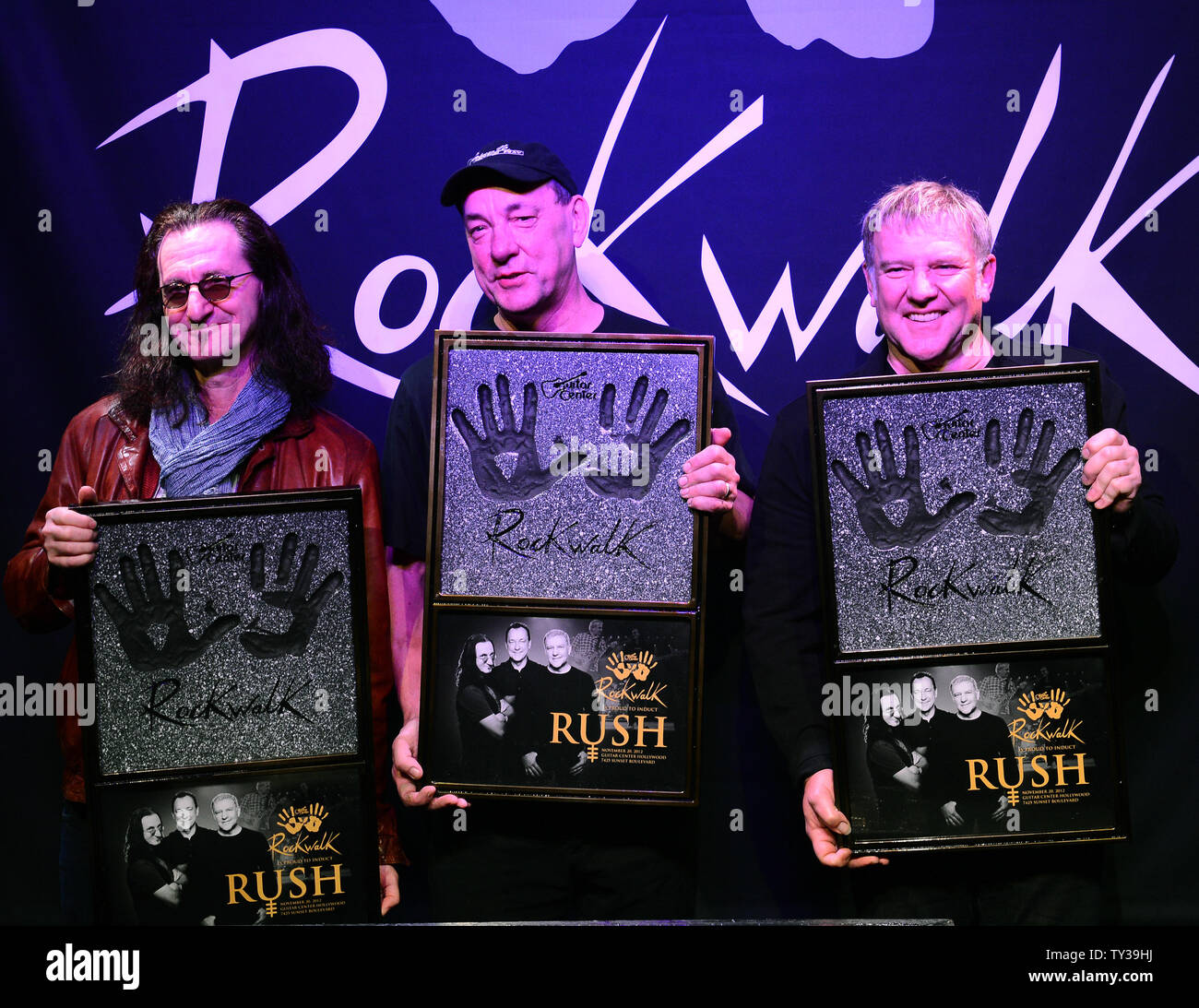 Members of the rock group Rush Geddy Lee, Neil Peart, Alex Lifeson (L-R ...
