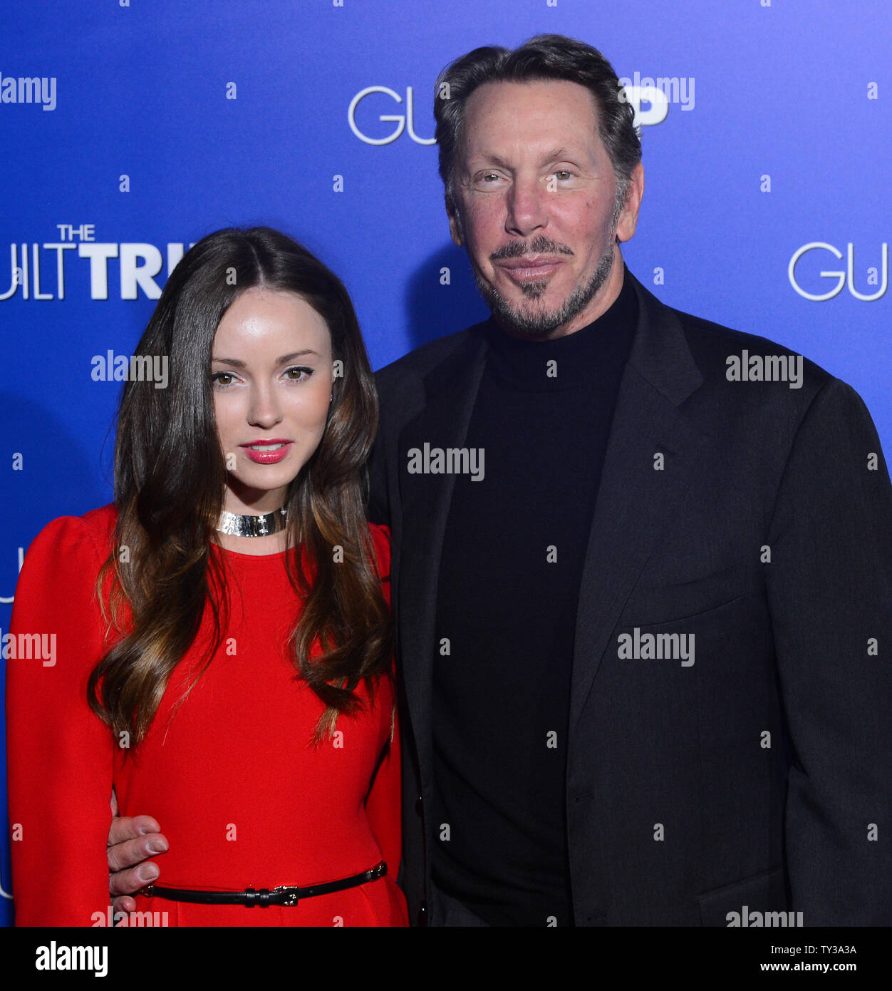Oracle CEO Larry Ellison and a guest attend the premiere of the motion ...