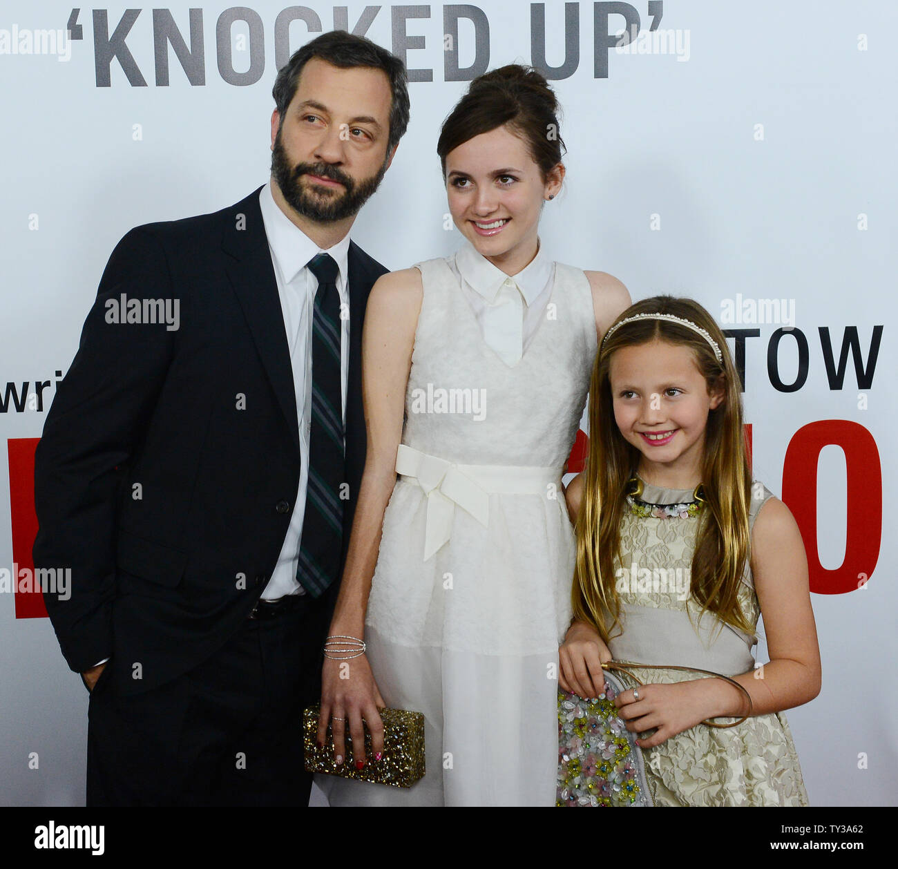 Director Judd Apatow,poses with his daughters Maude Apatow and Iris ...
