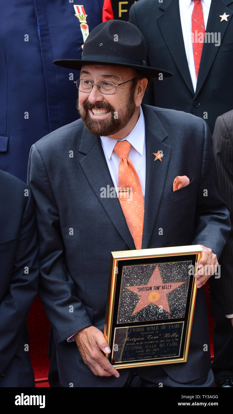 Local Los Angeles radio personality "Shotgun Tom" Kelly holds a replica ...
