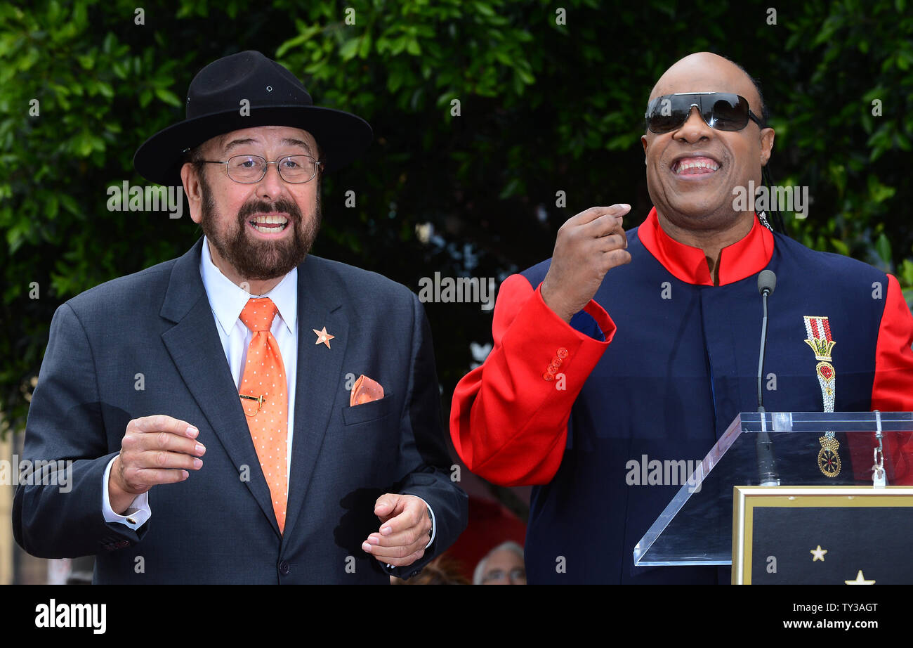 Local Los Angeles radio personality "Shotgun Tom" Kelly (L) reacts to ...