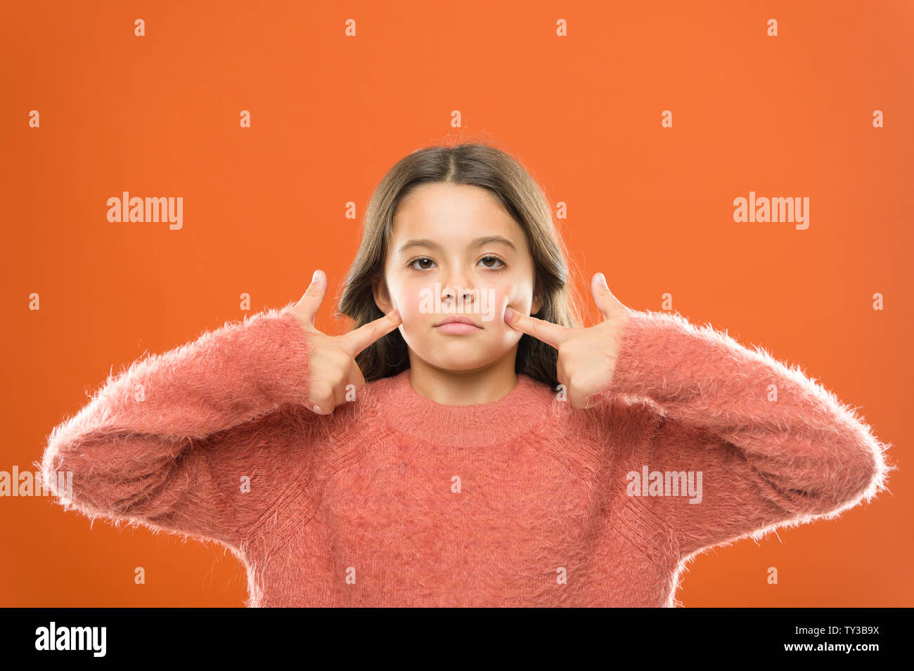 Face building exercises. Forever young. Girl cute kid elastic skin show ...