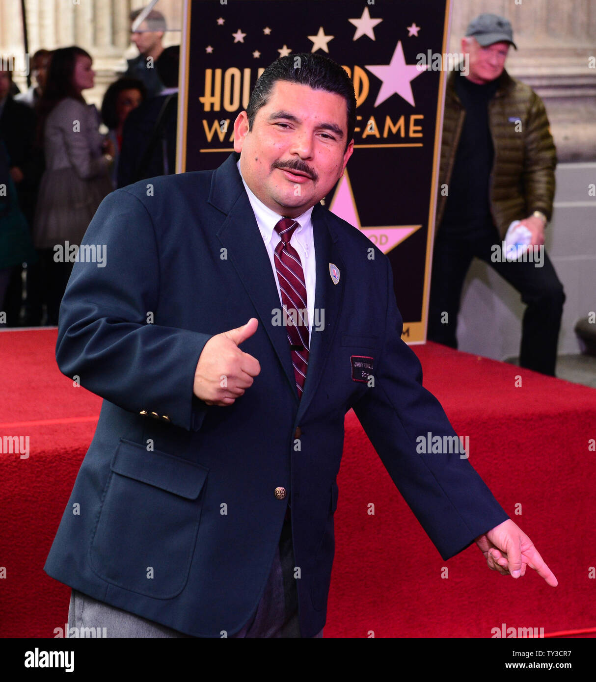 Talk show host Jimmy Kimmel's sidekick Guillermo Rodriguez poses during ...