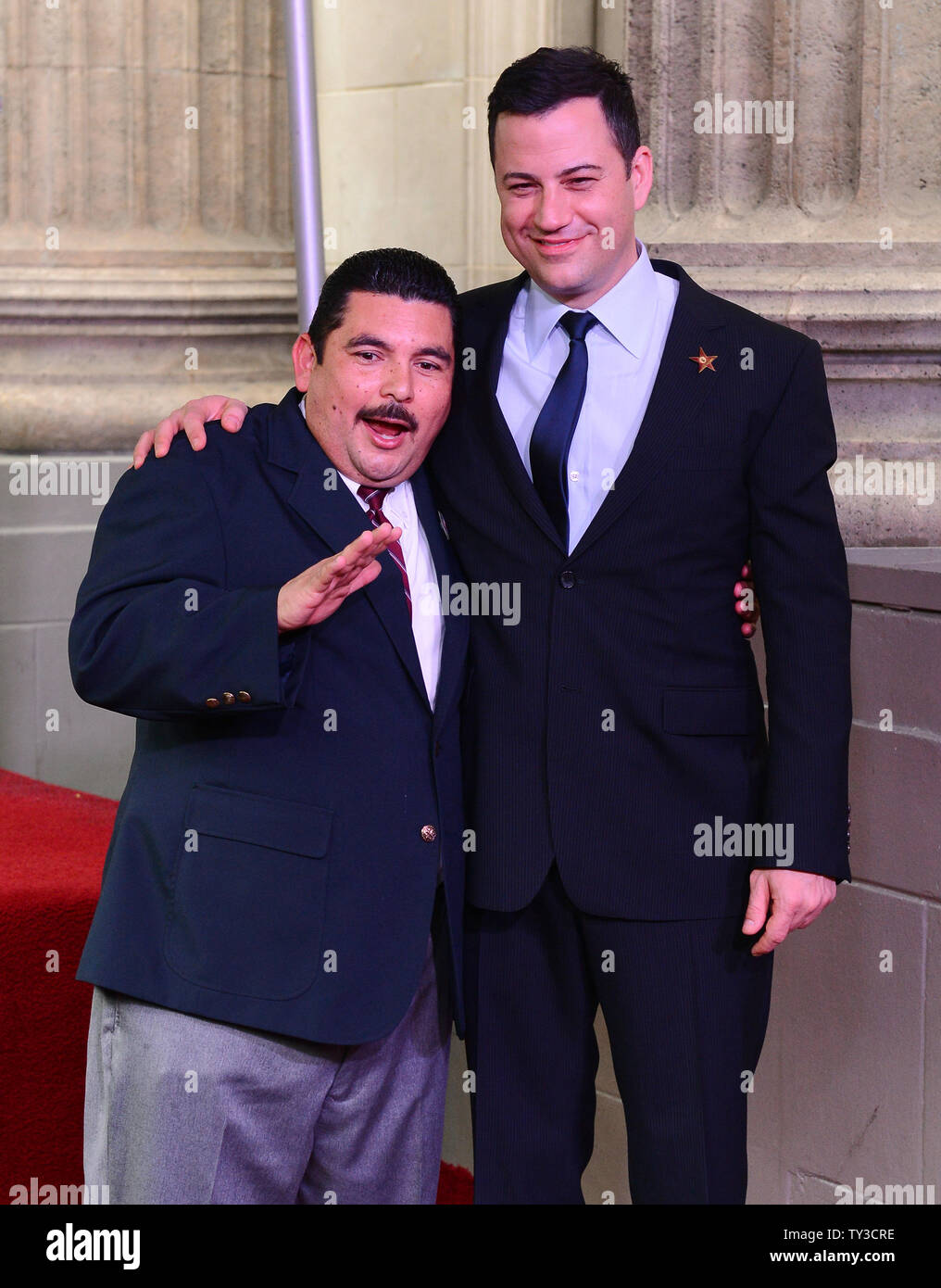 Talk show host Jimmy Kimmel poses with his show's sidekick Guillermo ...