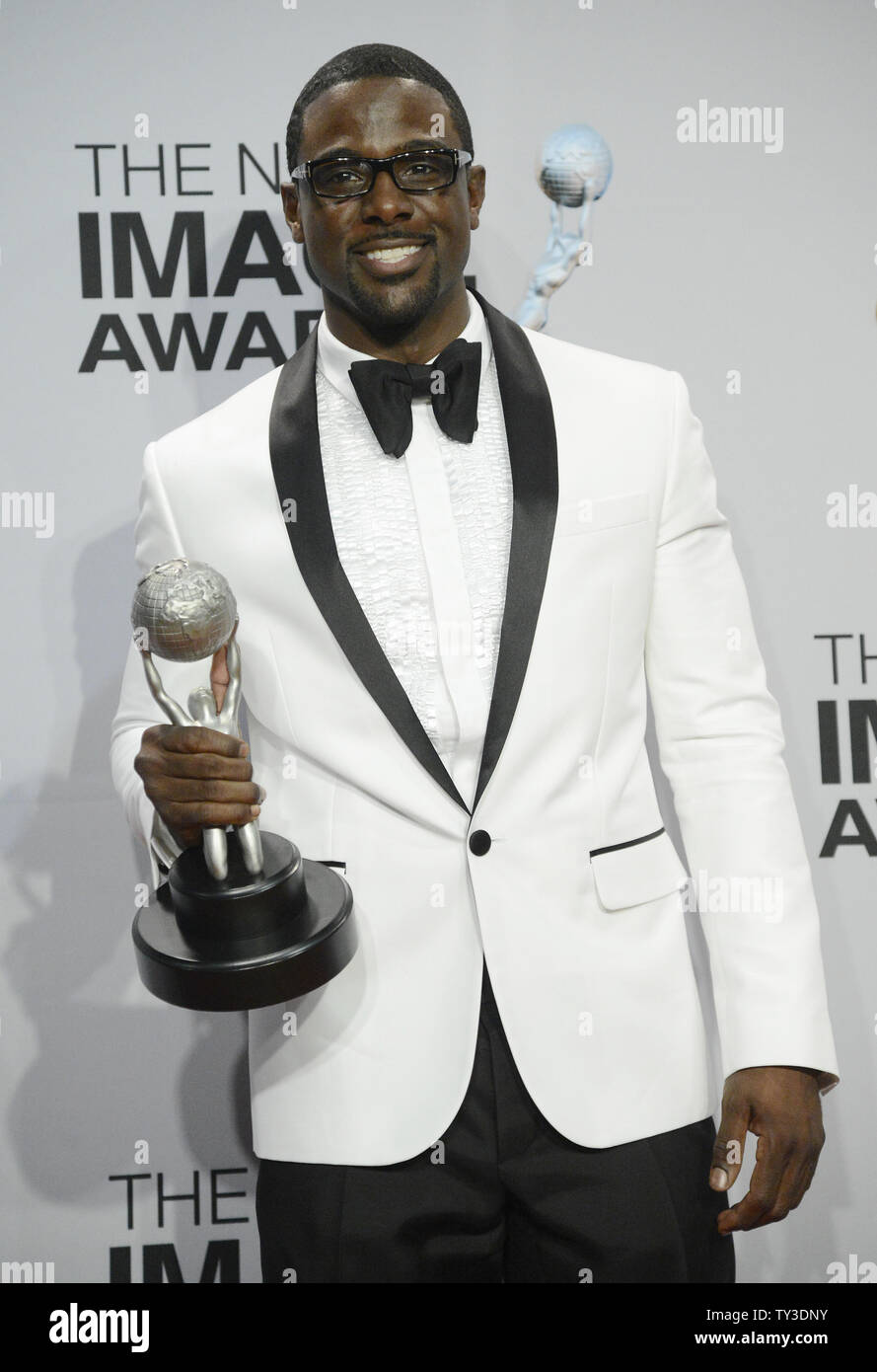 Actor Lance Gross holds the award for Outstanding Supporting Actor in a ...