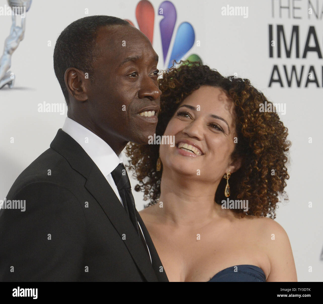 Actor Don Cheadle (L) and guest arrive for the 44th NAACP Image Awards ...
