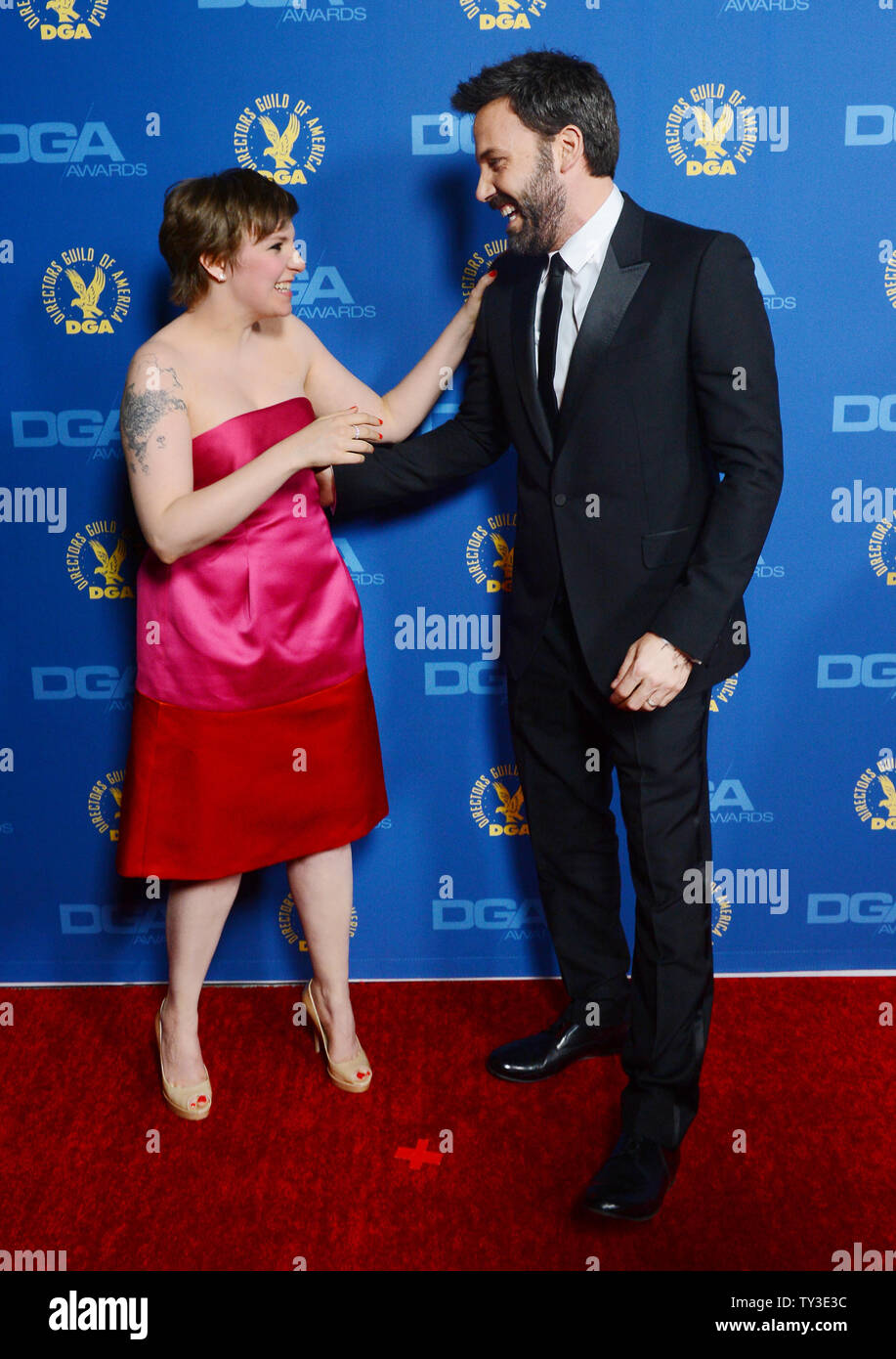 Actors Lena Dunham and Ben Affleck mingle as they attend the 65th ...