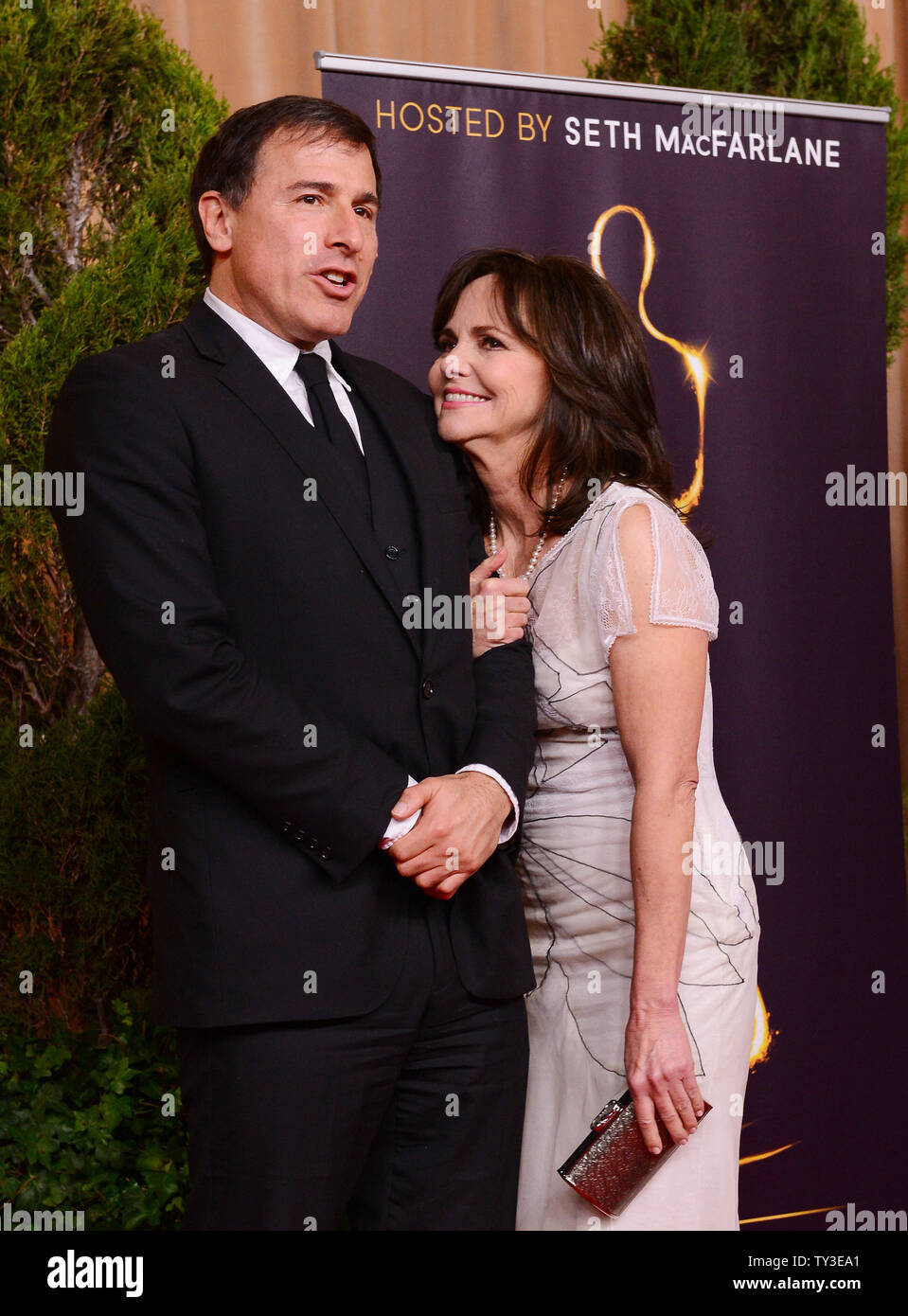 Director David O. Russell and actress Sally Field mingle at the 85th ...