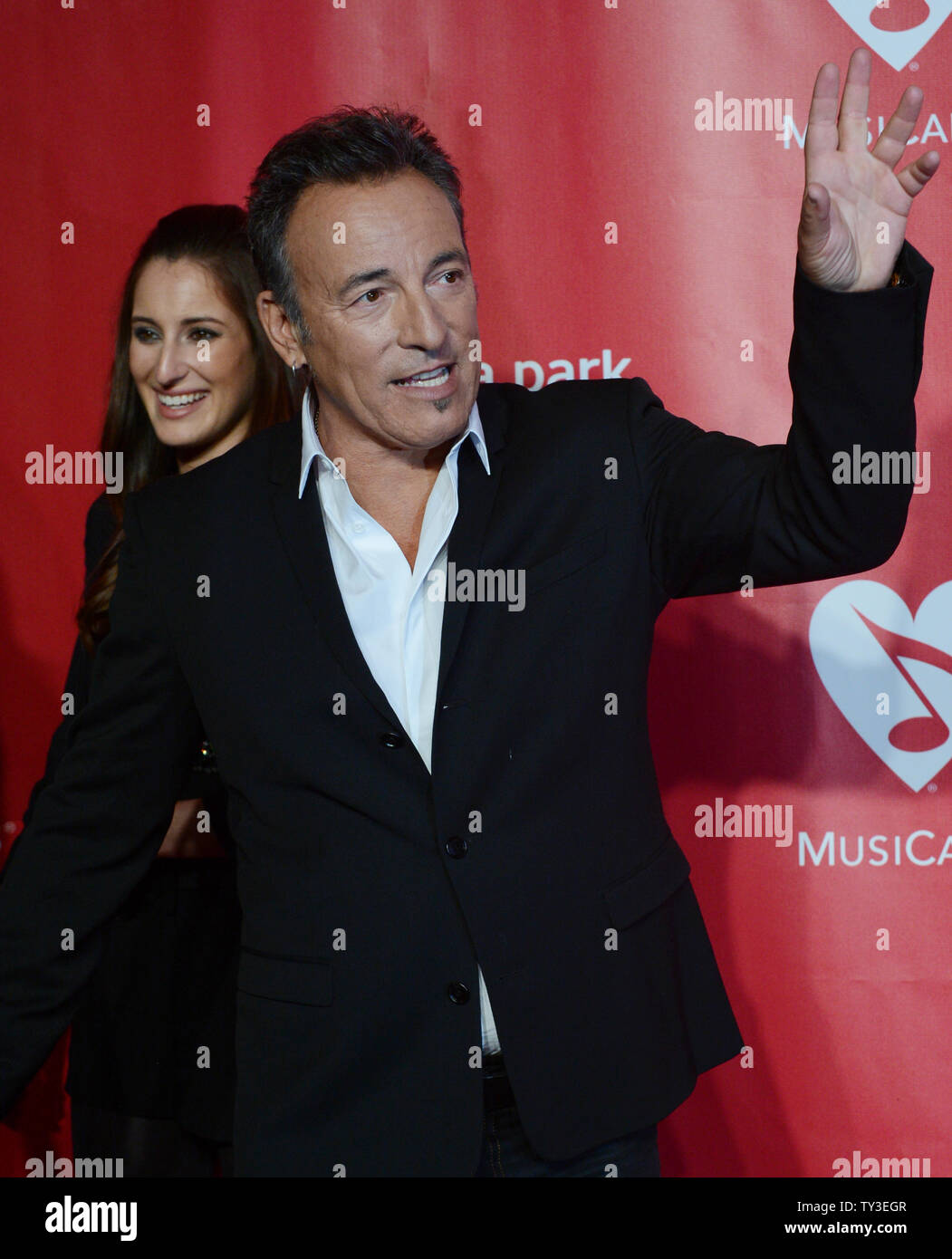Bruce Springsteen arrives at the 2013 MusiCares Person of the Year gala ...
