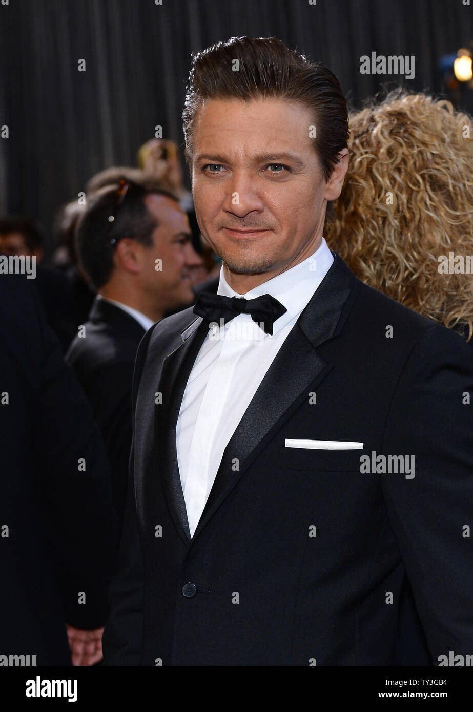 Actor Jeremy Renner arrives on the red carpet at the 85th Academy ...