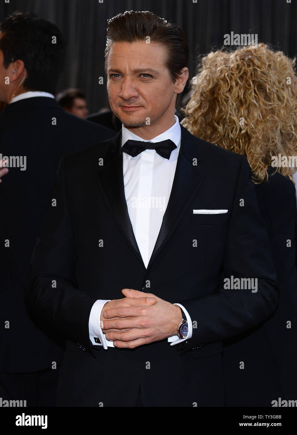 Actor Jeremy Renner arrives on the red carpet at the 85th Academy ...