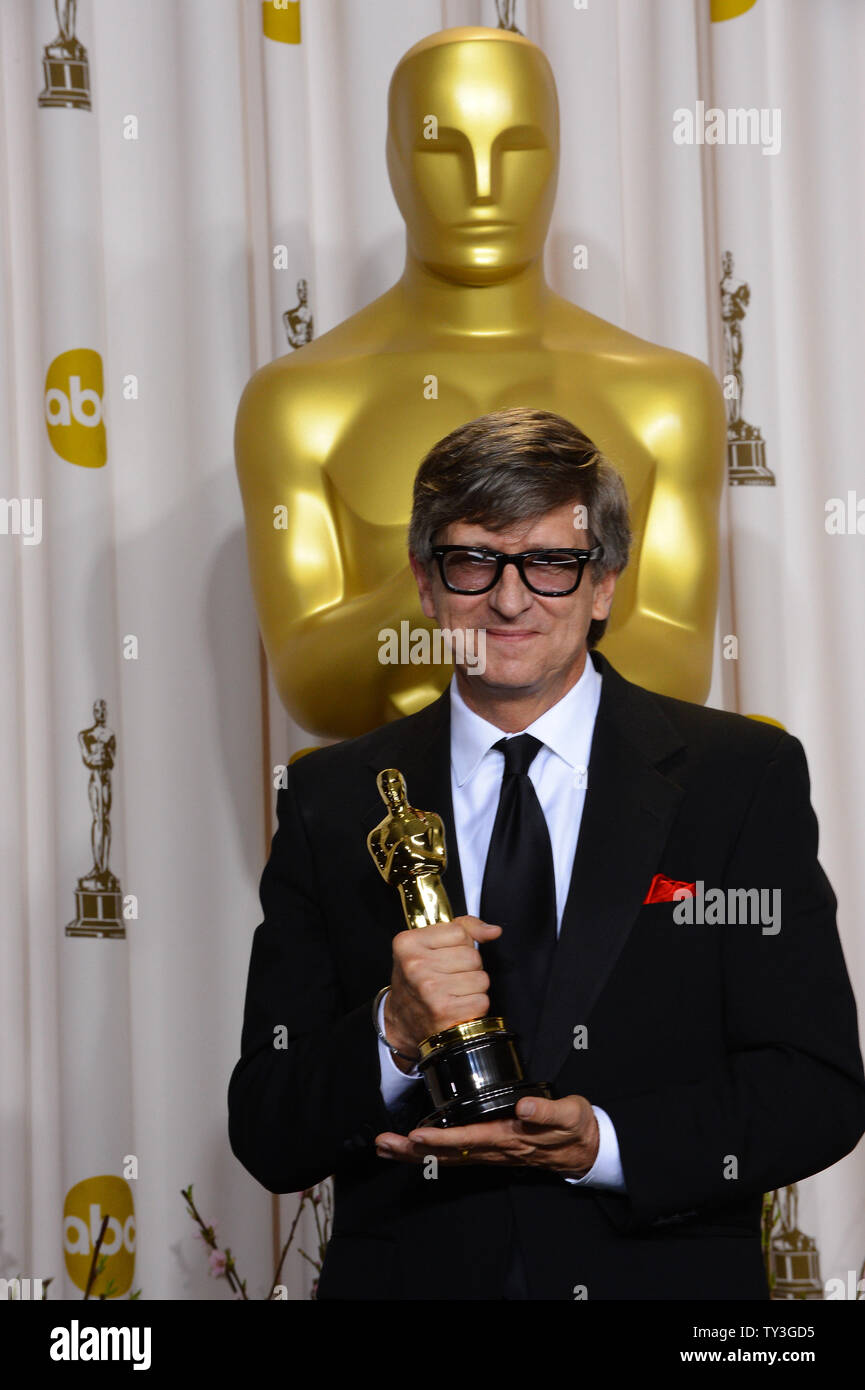 Rick Carter holds the Oscar Achievement in Production Design for ...