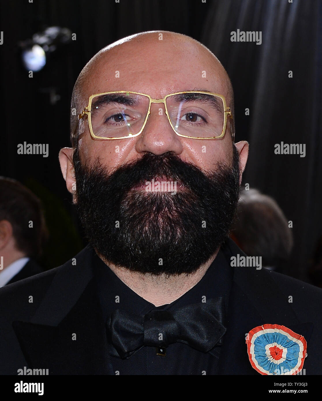 Costume designer Paco Delgado arrives on the red carpet at the 85th ...