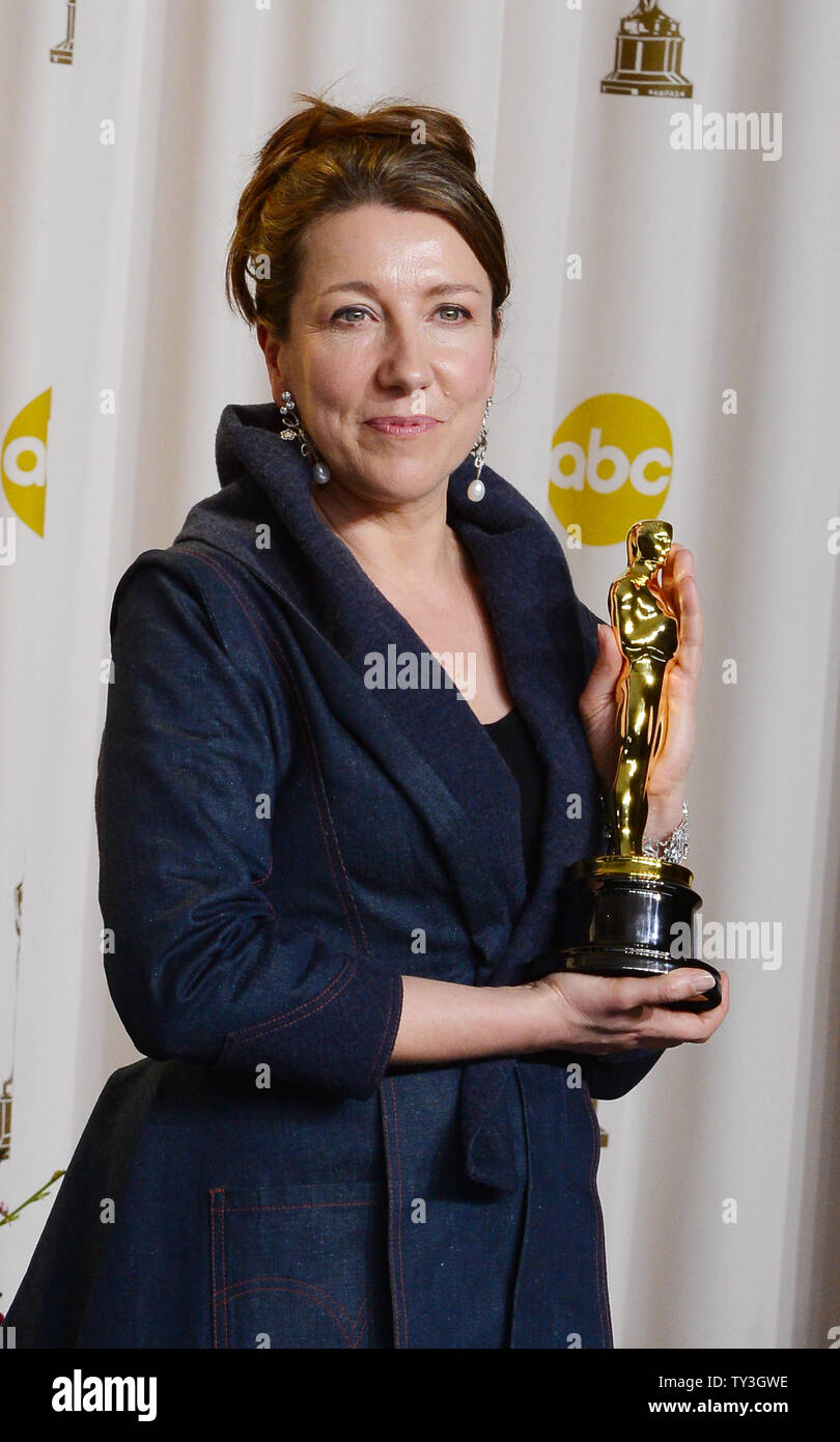Jacqueline Durran holds her Oscar for best Achievement in Costume ...