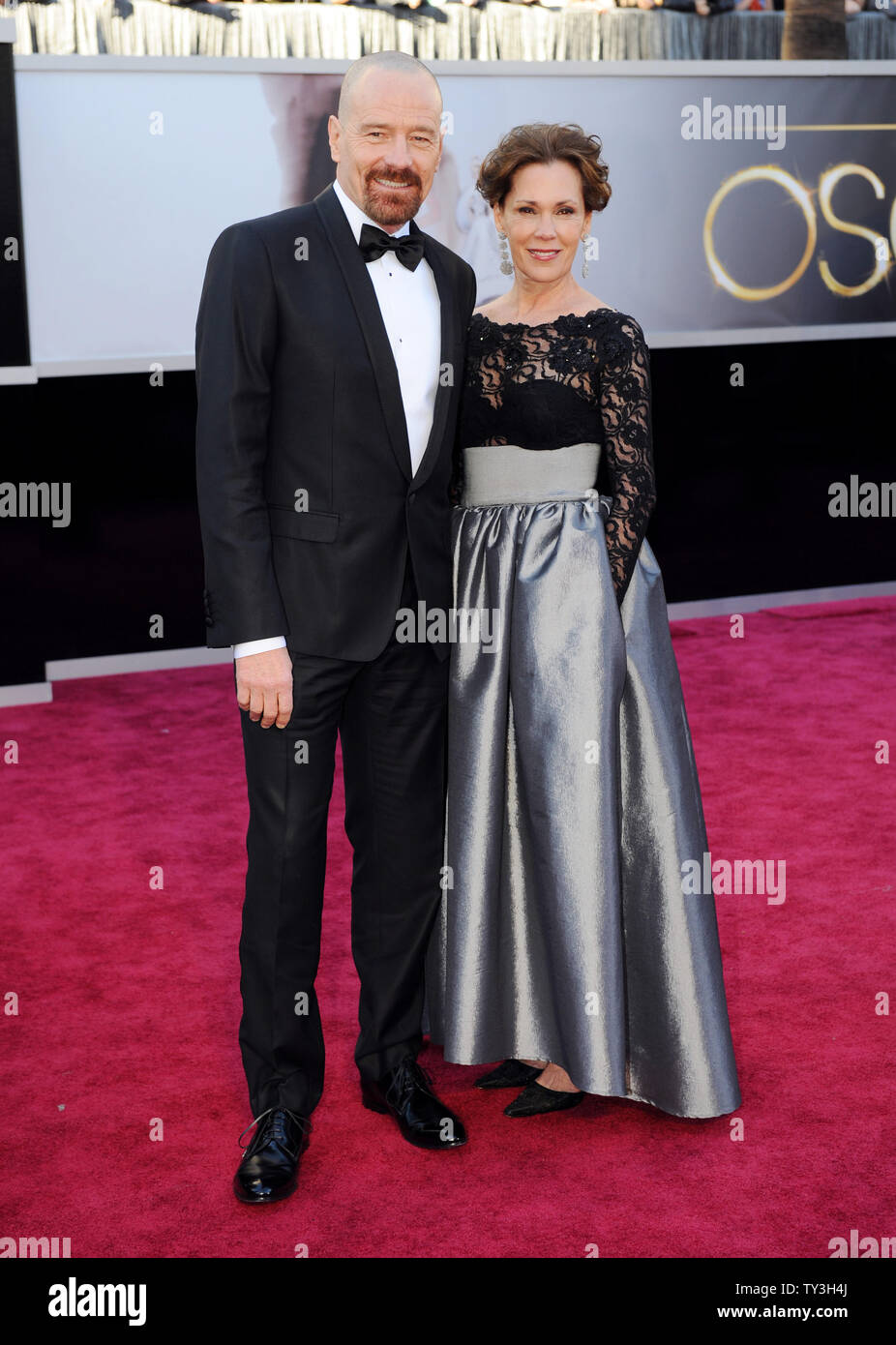 Bryan Cranston and Robin Bearden arrive on the red carpet at the 85th ...