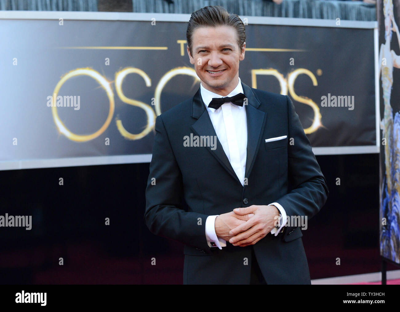 Jeremy Renner arrives on the red carpet at the 85th Academy Awards at ...