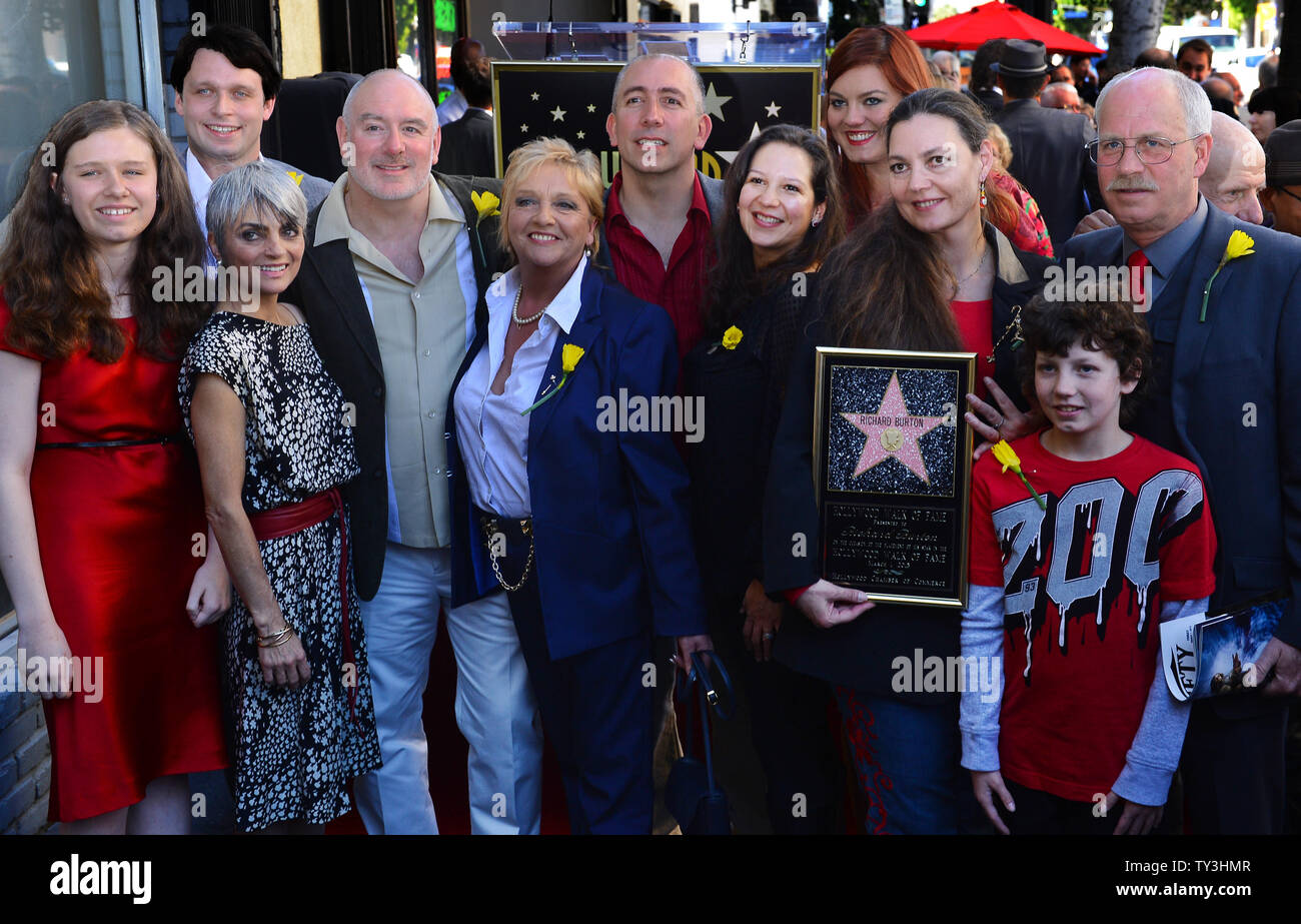 Family members gather during an unveiling ceremony, honoring Academy ...