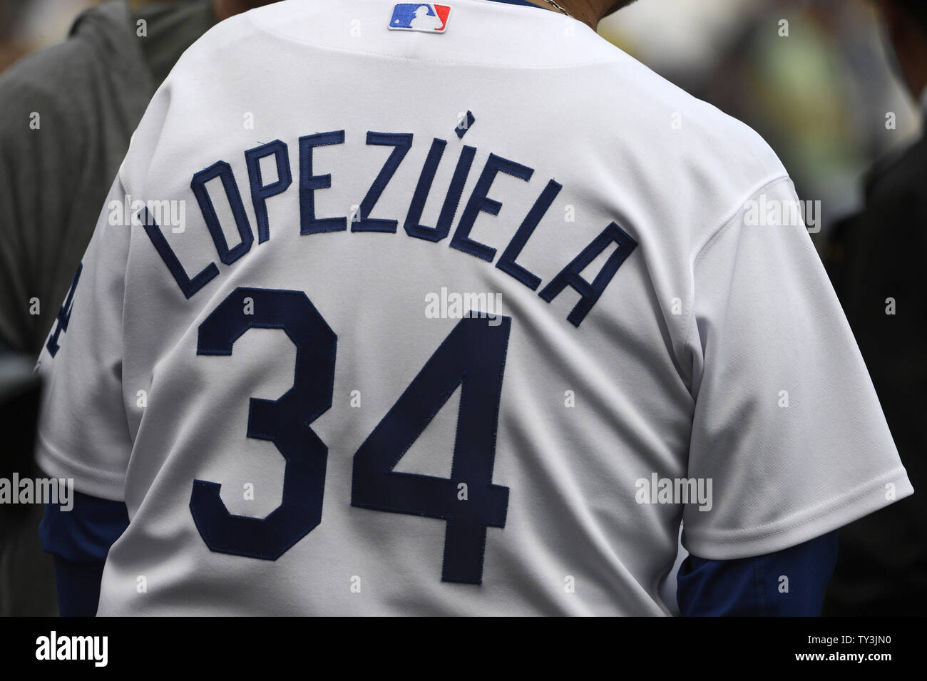 Comedian George Lopez is seen on the field before the Los Angeles ...