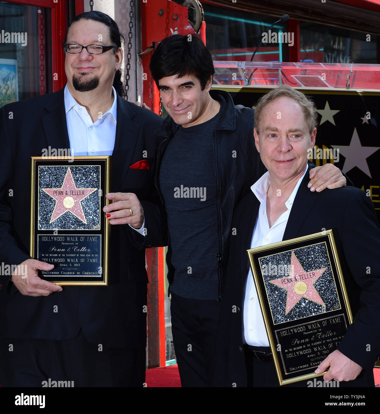 Magician David Copperfield (C) joins Penn Jillette (L) and Raymond ...