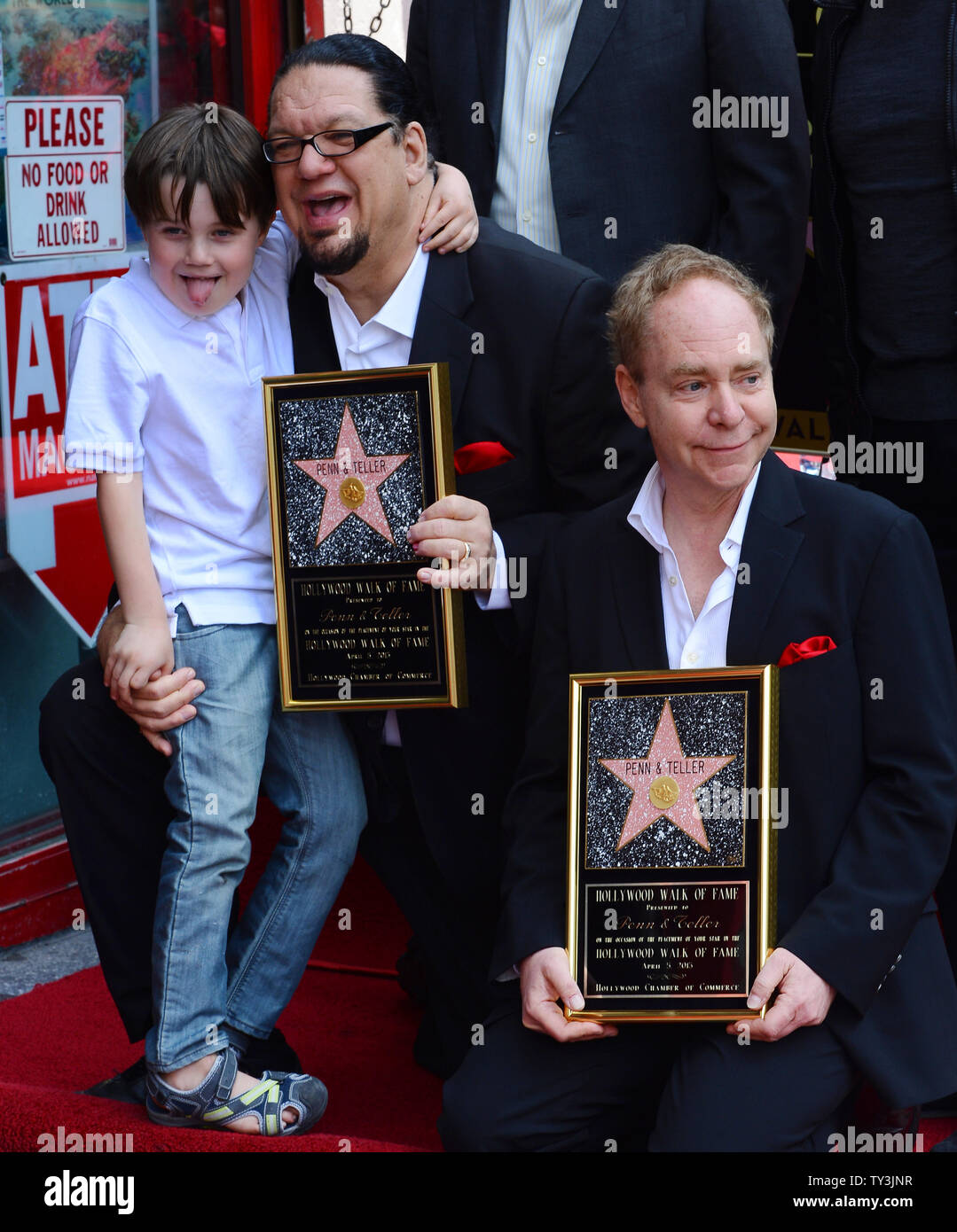 Penn Jillette (C) and Raymond Teller of the comedy/magic duo Penn ...