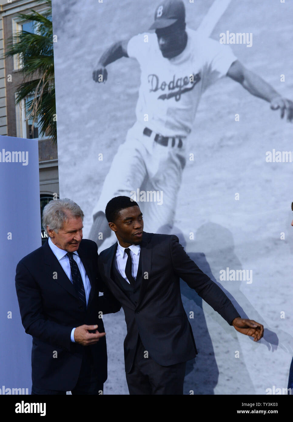 Harrison Ford and Chadwick Boseman attend the premiere of "42" at the ...