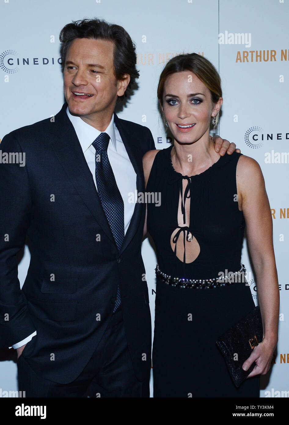Cast members Colin Firth (L) and Emily Blunt pose as they attend the ...