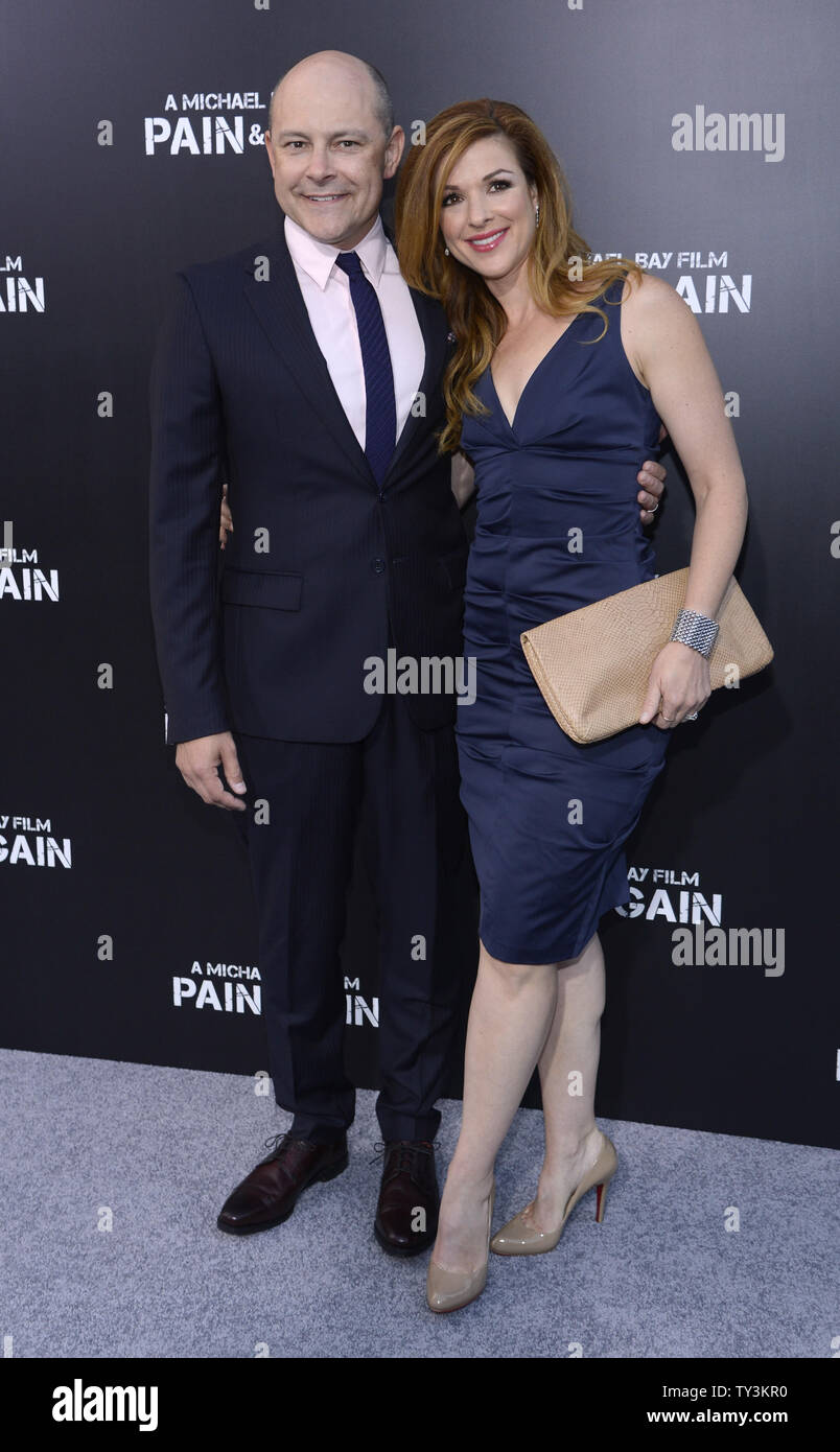 Cast member Rob Corddry (L) and wife Sandy attend the premiere of the ...