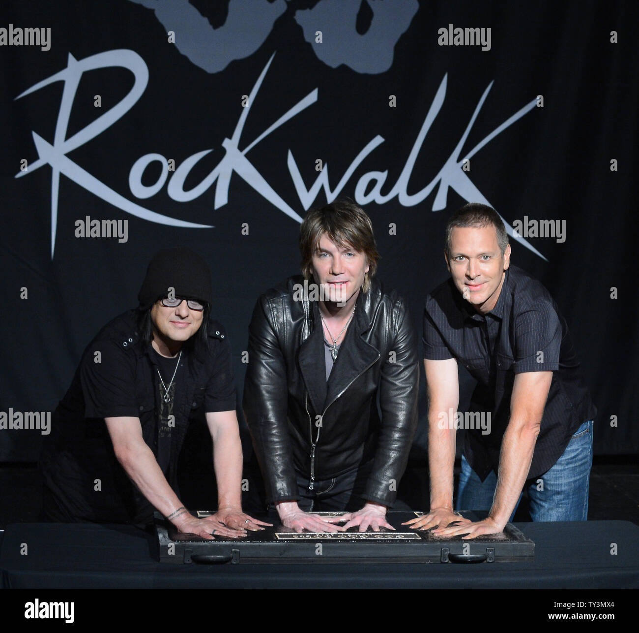 Members of the rock band Goo Goo Dolls, Robby Takac, John Rzeznik and ...