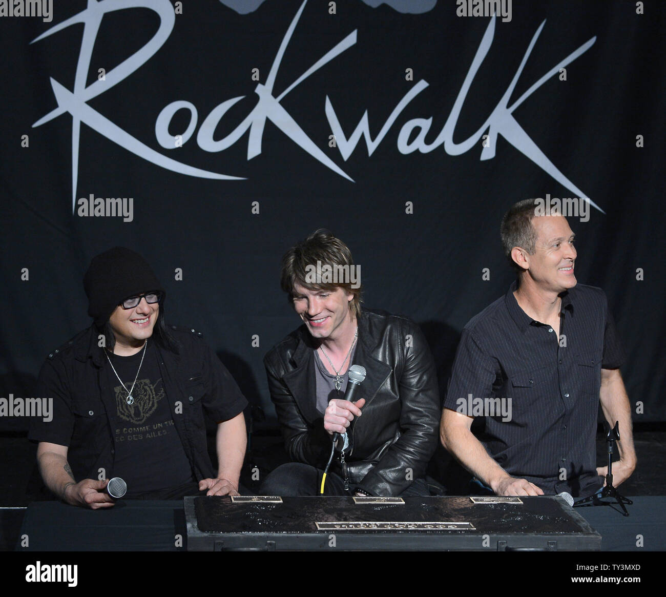 Members of the rock band Goo Goo Dolls, Robby Takac, John Rzeznik and ...