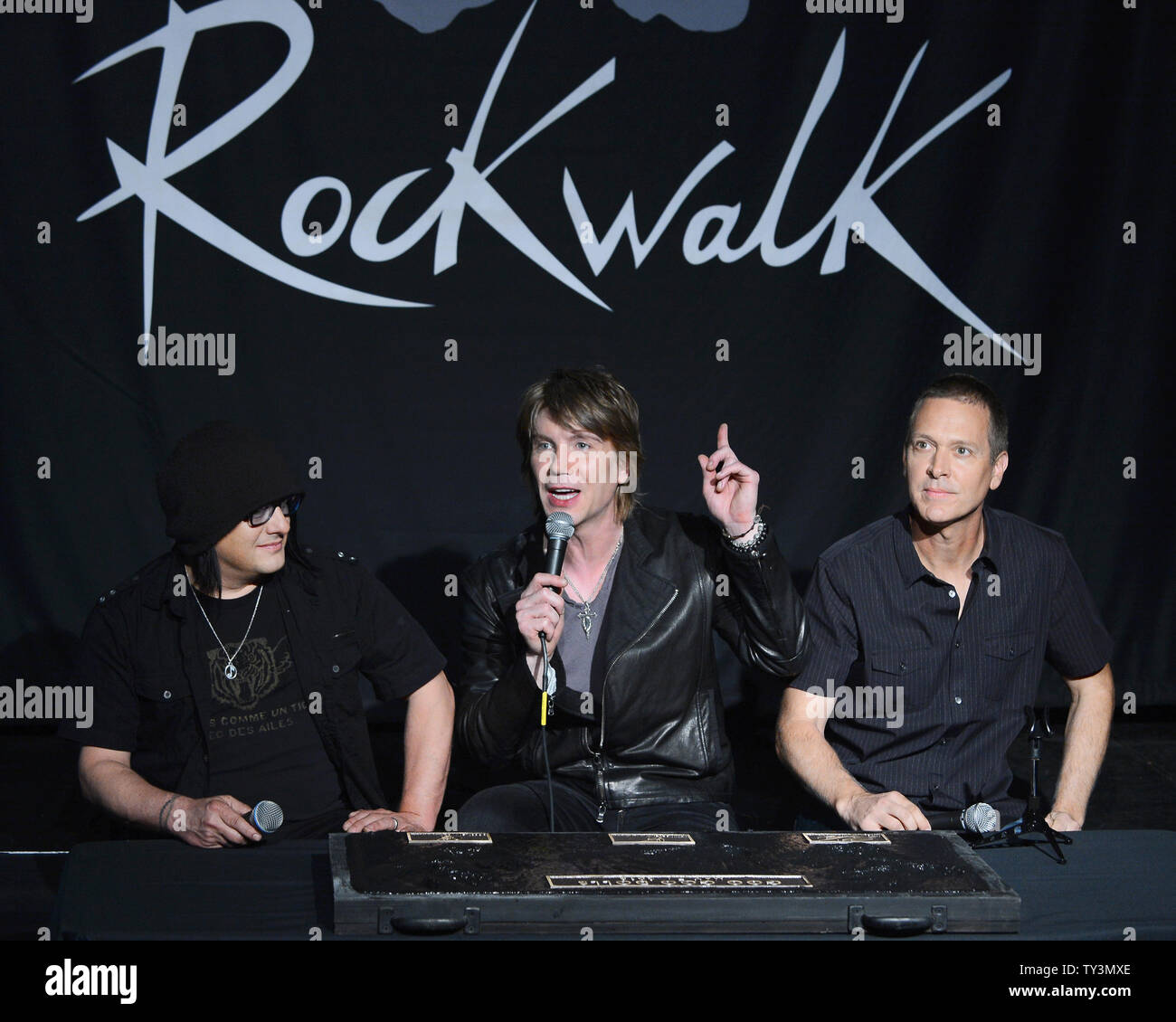 Members of the rock band Goo Goo Dolls, Robby Takac, John Rzeznik and ...