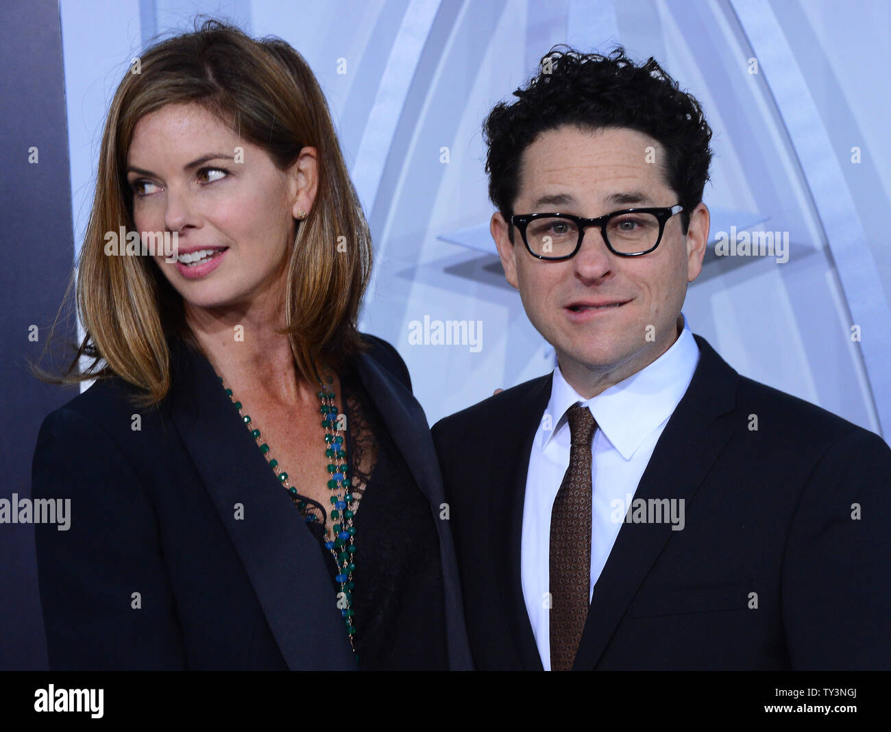 Director J.J. Abrams (R) and his wife Katie McGrath attend the premiere ...