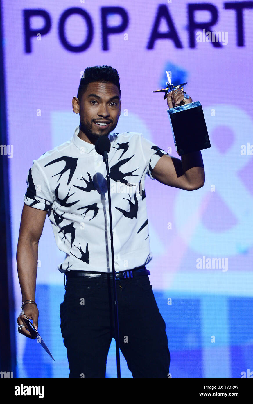 Miguel wins the best male R&B Artist award during BET Awards 13 at the ...