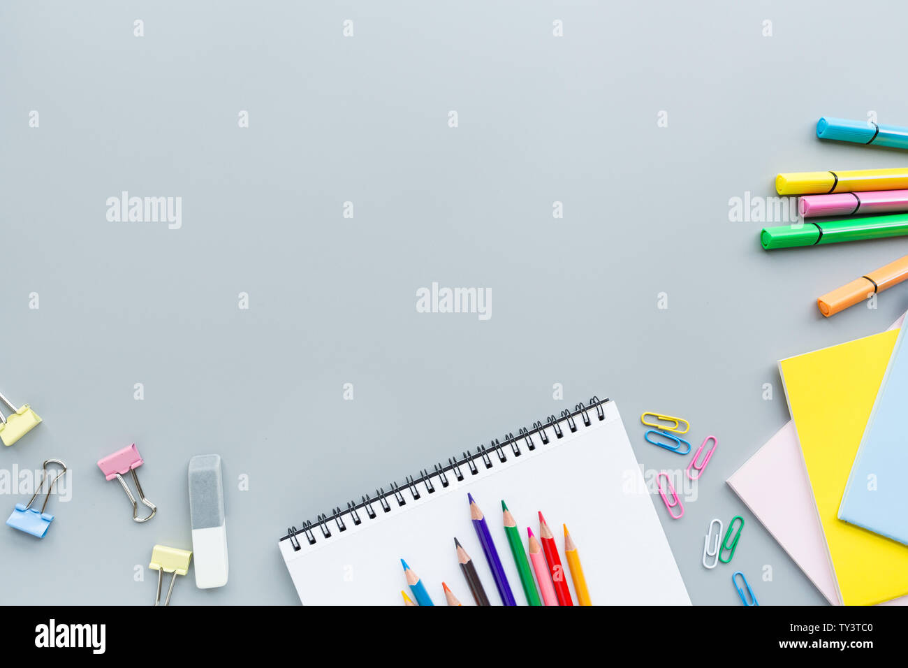 Orange back to school flat lay with bright stationery. School supplies ...