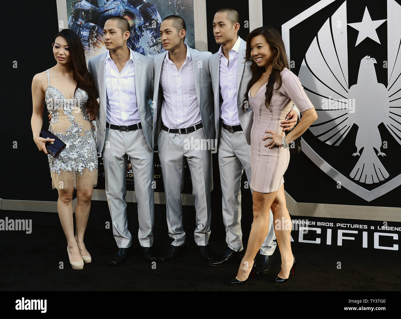 The Luu triplets (R-L) Lance, Charles, and Mark arrive for the premiere ...
