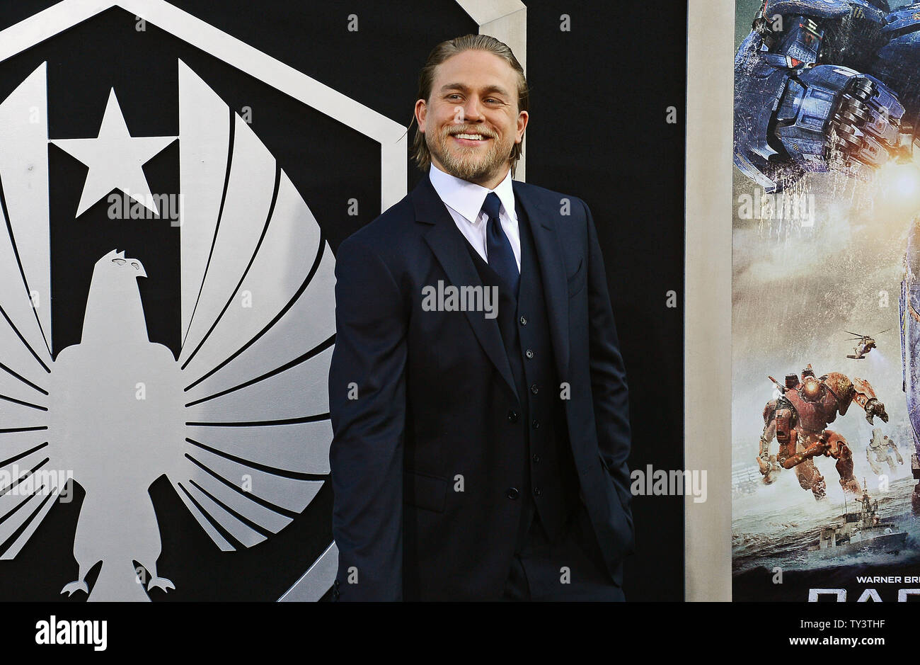 Actor Charlie Hunnam arrives for the premiere of Pacific Rim at the ...
