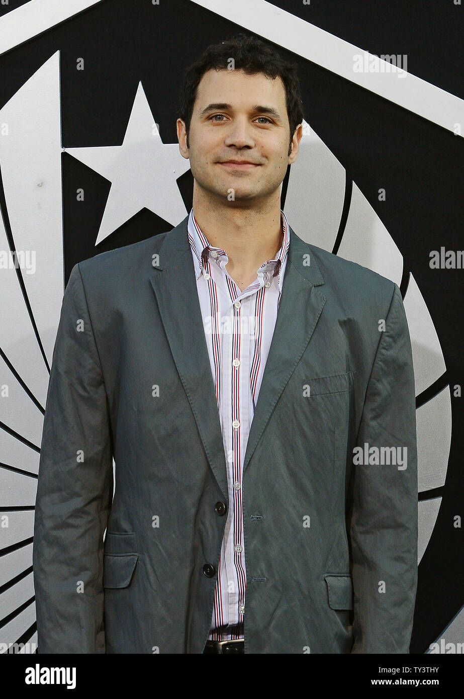 Composer Ramin Djawadi arrives for the premiere of Pacific Rim at the ...