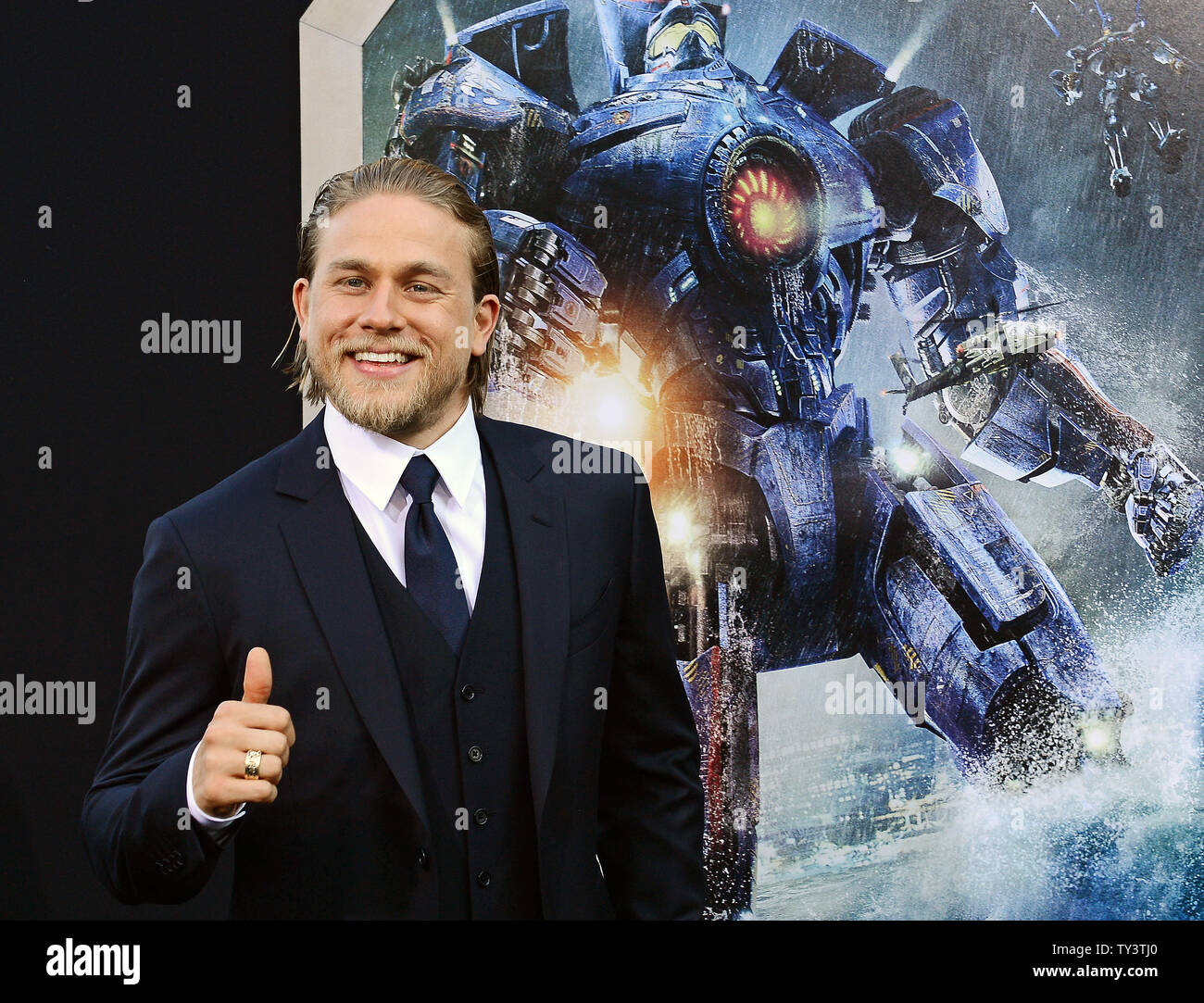 Actor Charlie Hunnam arrives for the premiere of Pacific Rim at the ...