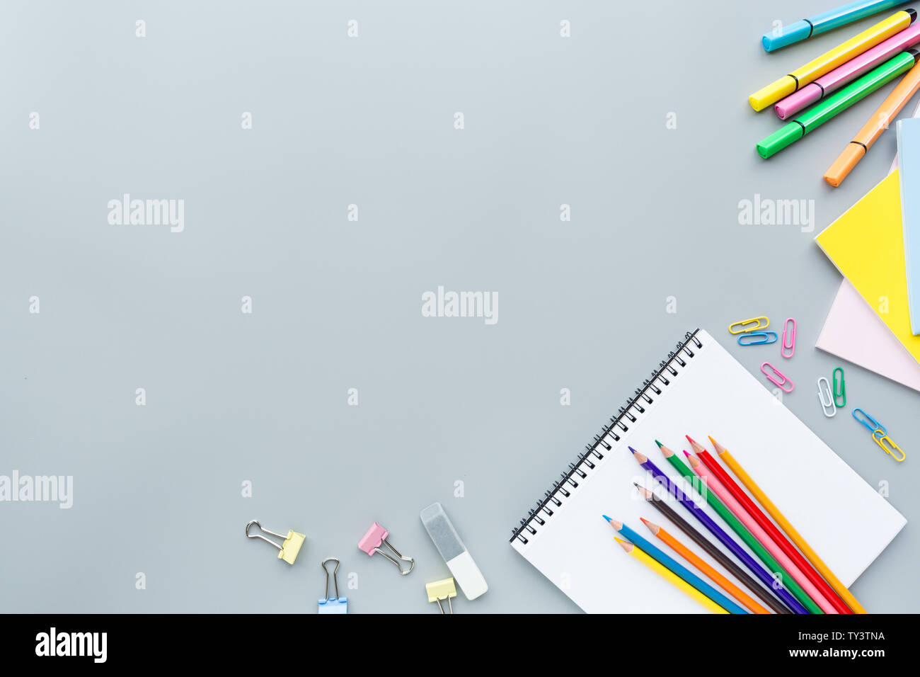 Orange back to school flat lay with bright stationery. School supplies ...