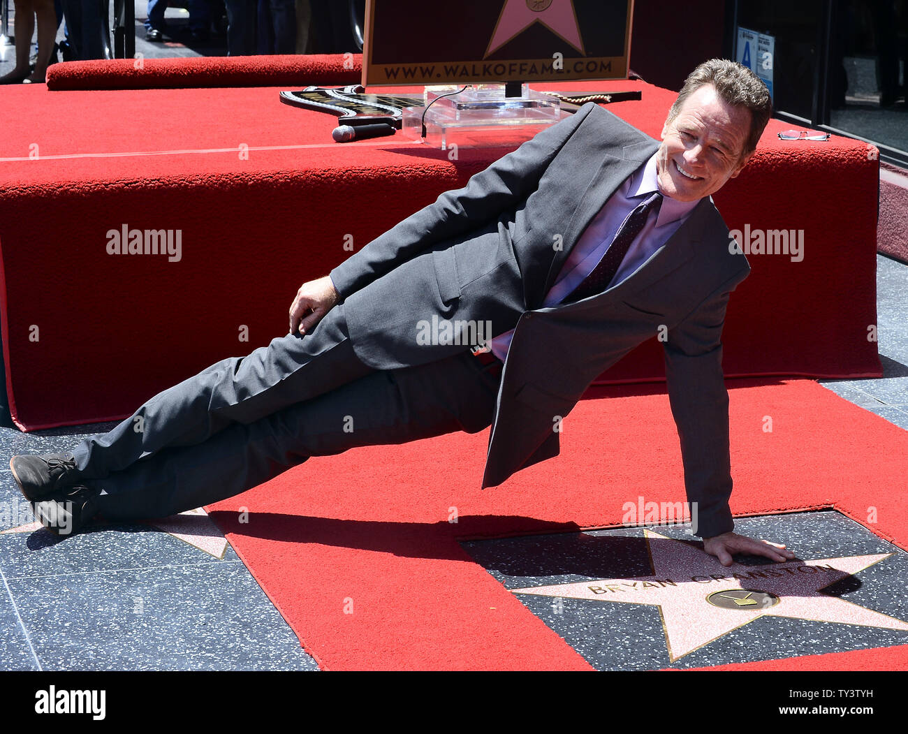 Bryan Cranston strikes a pose during an unveiling ceremony honoring him ...