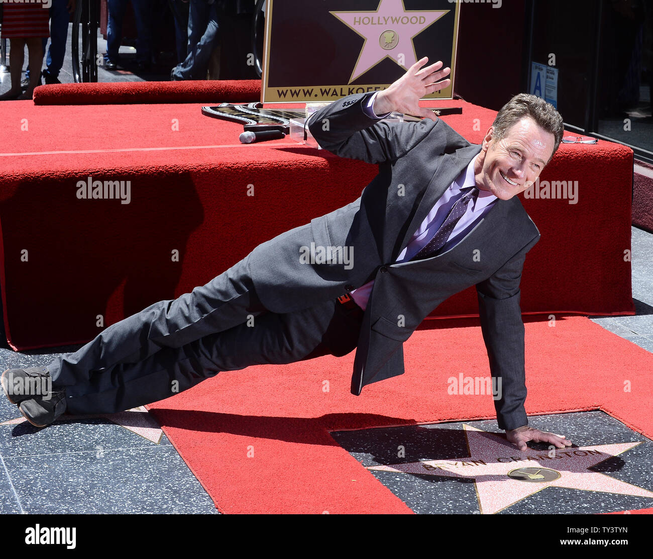 Bryan Cranston strikes a pose during an unveiling ceremony honoring him ...