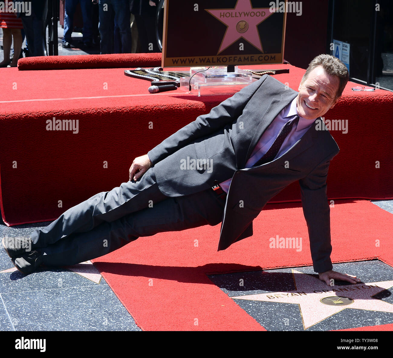 Bryan Cranston strikes a pose during an unveiling ceremony honoring him ...